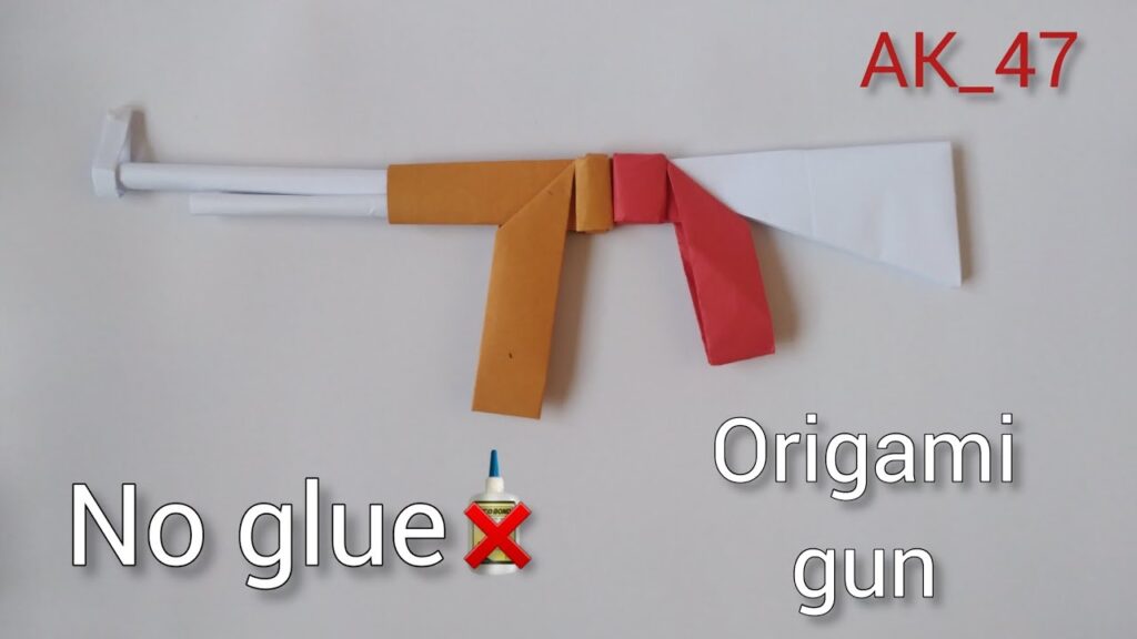 Tutorial on how to make an easy paper origami gun without using glue to ...